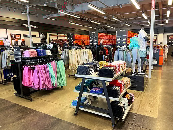 A rainbow of athletic wear beckons shoppers at the Nike outlet—because even your workout clothes deserve a fashion upgrade at desert discount prices.