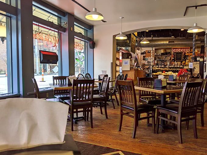 Wooden tables, warm lighting, and the promise of deli treasures just beyond. This isn't just a meal—it's a pilgrimage.