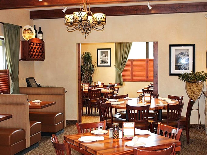 Warm wooden tables, elegant chandeliers, and that inviting glow – the dining room practically whispers, "Stay awhile and mangia!"