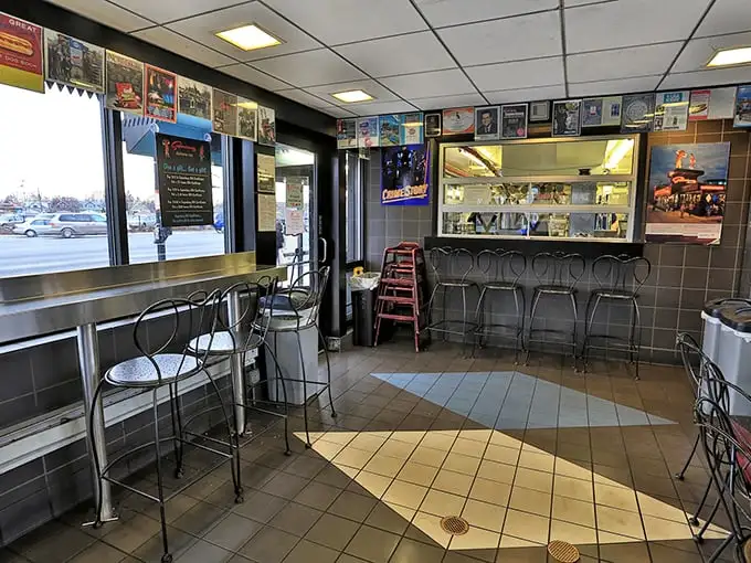 The indoor seating area offers refuge when Chicago weather turns temperamental, with classic diner charm that transports you straight back to the golden age of drive-ins.