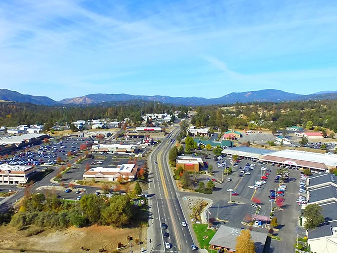 An aerial view that says it all – Oakhurst nestled in nature's pocket, where civilization meets wilderness without awkward small talk.