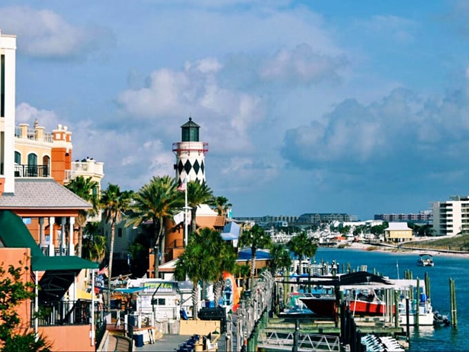That black and white lighthouse isn't just for show—it's the nautical equivalent of Destin saying, "Look at me, I'm gorgeous AND functional!"