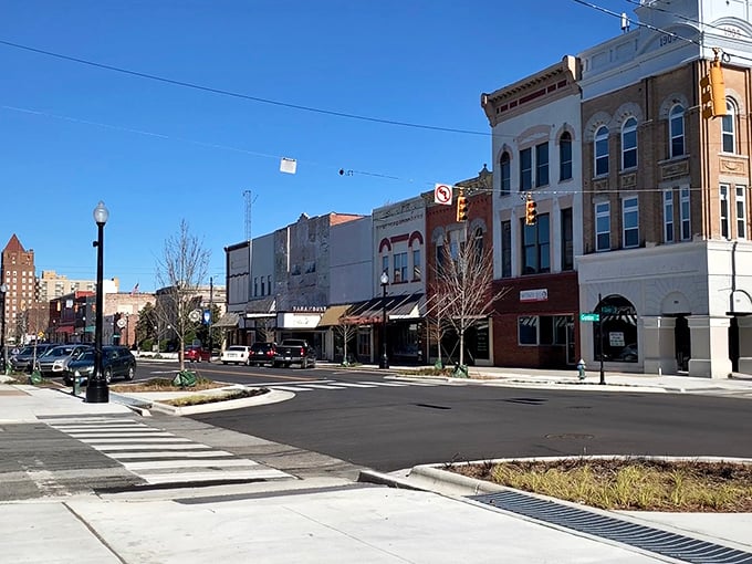 These historic storefronts aren't museum pieces – they're filled with shops, restaurants, and reasons to parallel park.