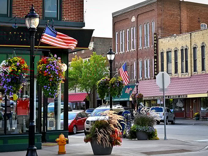 Flower baskets and American flags line Main Street, creating that Norman Rockwell painting you didn't know you were homesick for.