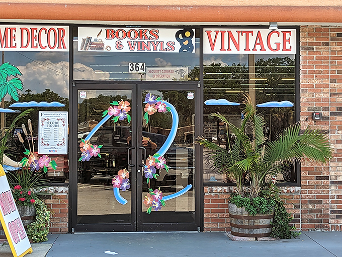 Books, vinyls, and vintage treasures announce themselves at this colorful entrance. The flower-adorned doorway welcomes browsers into a wonderland of yesteryear.
