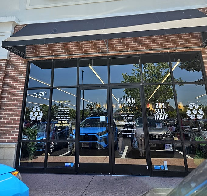 Open signs never looked so inviting. The glass entrance reflects both sky and possibility—a portal to style without the sticker shock.
