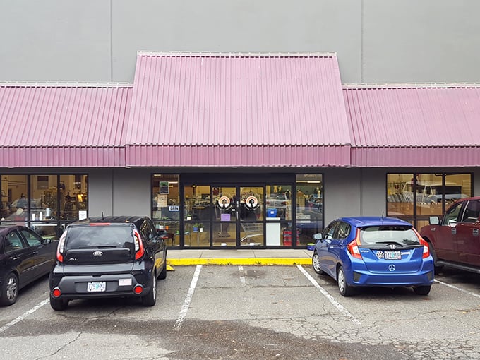 Where thrift dreams begin! The entrance might look ordinary, but stepping through these doors is like finding the wardrobe to Narnia – except with vintage denim instead of snow.