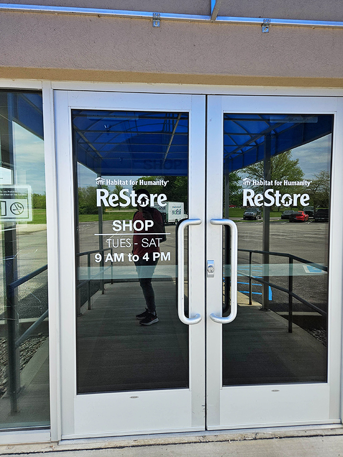 The glass doors beckon like portals to possibility – Tuesday through Saturday, adventure awaits inside.