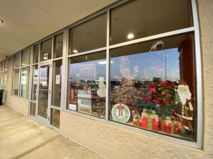 Holiday cheer greets shoppers before they even step inside. That Santa in the window isn't judging your thrift habits – he's encouraging them!