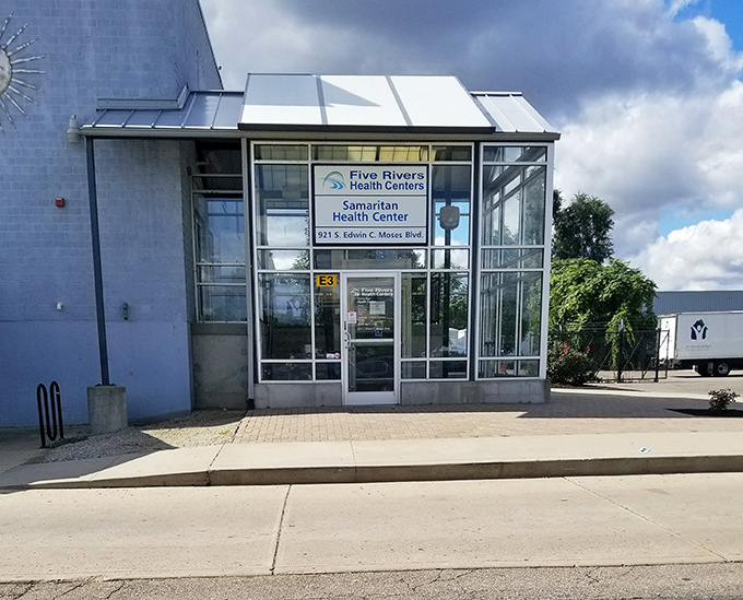 Not just an entrance—it's a portal to possibility. The Five Rivers Health Center shares this community-focused space.