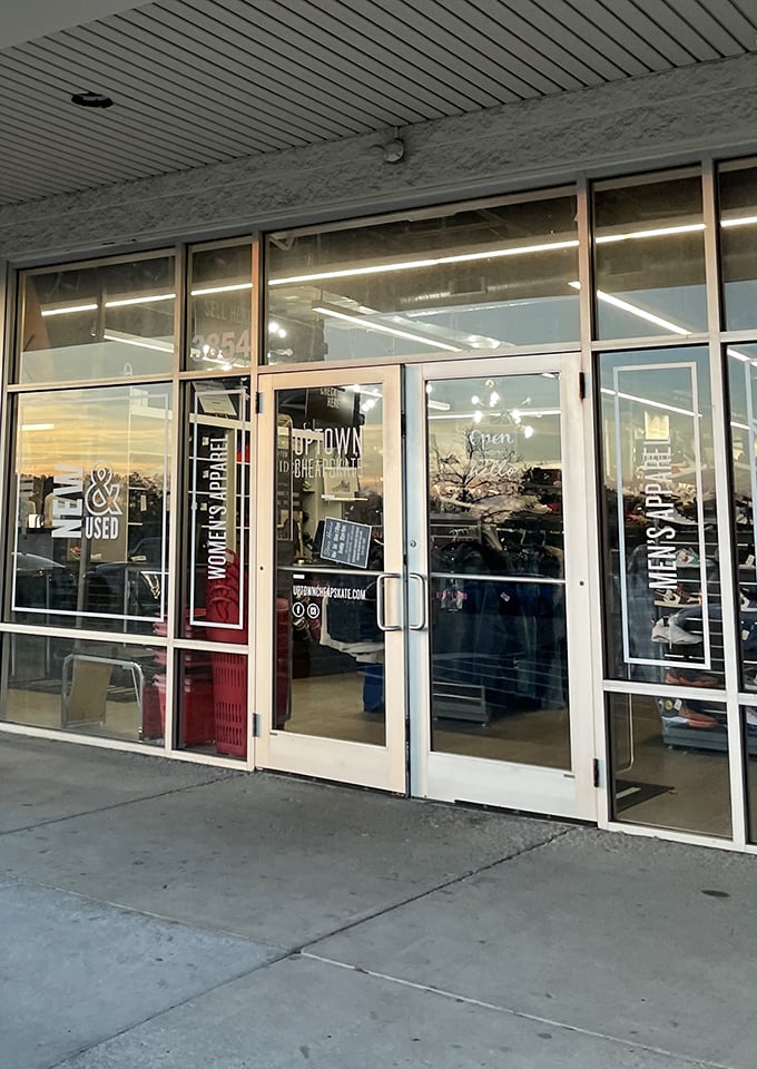 Glass doors that might as well be portals to a parallel universe where designer labels don't require a second mortgage.