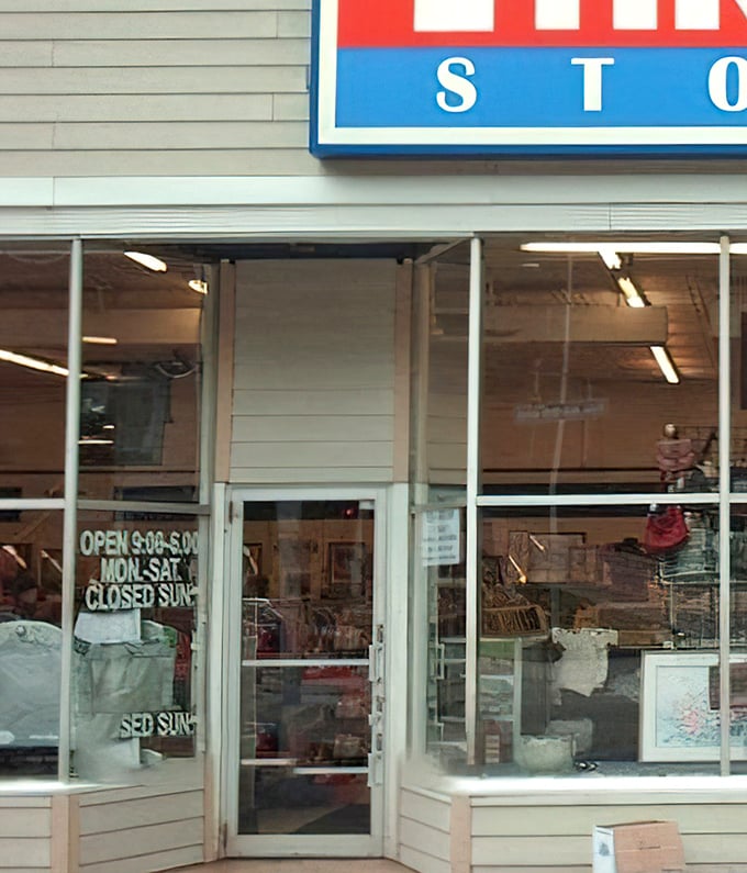 Business hours painted on glass doors invite thrifters into a world where retail rules are suspended and discovery becomes the main currency.