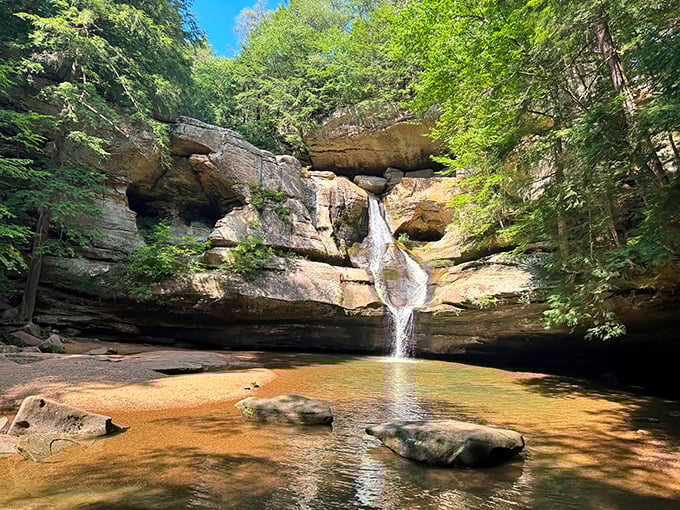Water finds a way, carving this elegant cascade through ancient sandstone. Stand here long enough and you'll feel your stress dissolving just like the rock.