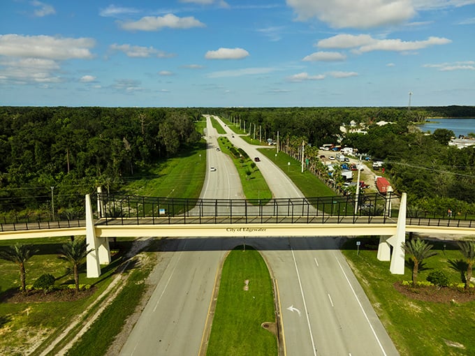 The "Welcome to Edgewater" bridge spans more than just highway - it connects affordability dreams.