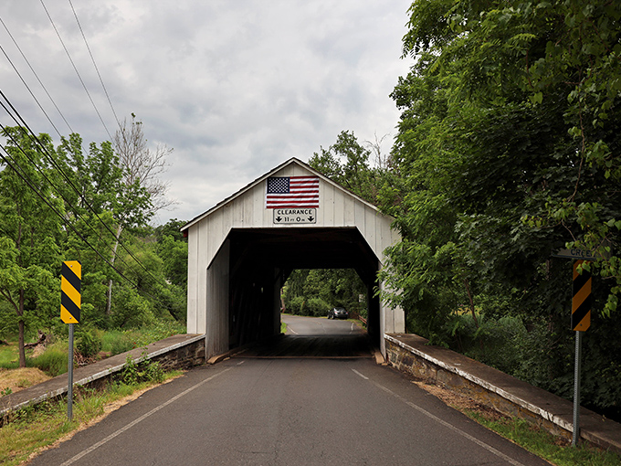 The entrance view reveals the American flag proudly displayed above the clearance sign—patriotism and practicality in perfect harmony.