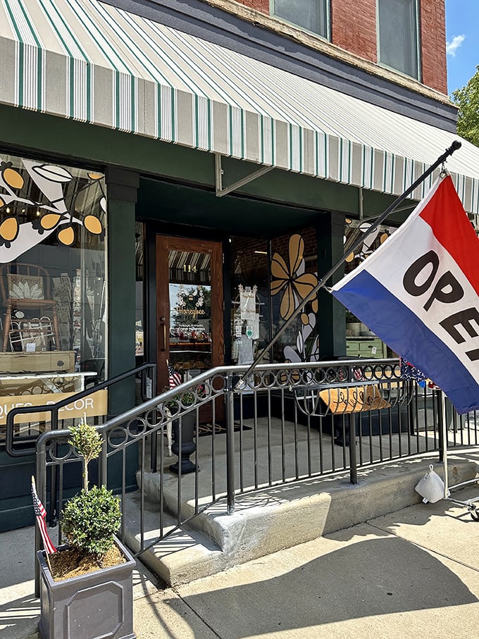 That "OPEN" flag might as well say "ADVENTURE AWAITS" – the wrought iron railing a perfect prelude to vintage discoveries.