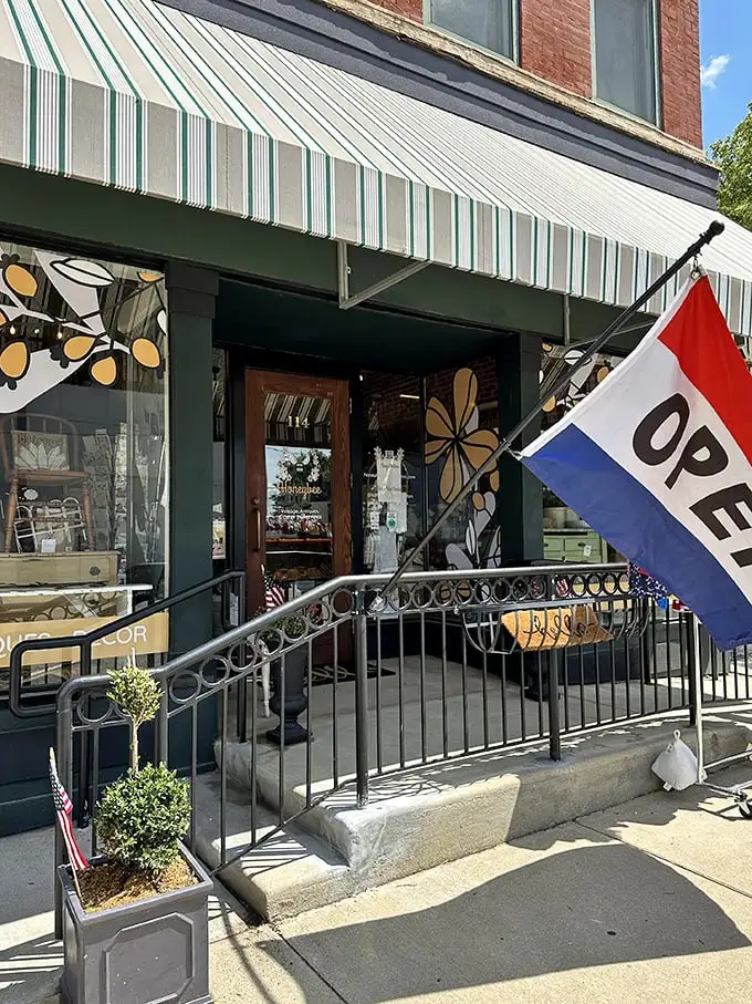 That "OPEN" flag might as well say "ADVENTURE AWAITS" – the wrought iron railing a perfect prelude to vintage discoveries.