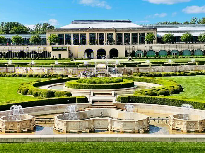 Architectural elegance meets horticultural brilliance in this view that makes you wonder if you've stumbled into a royal European estate rather than Pennsylvania.