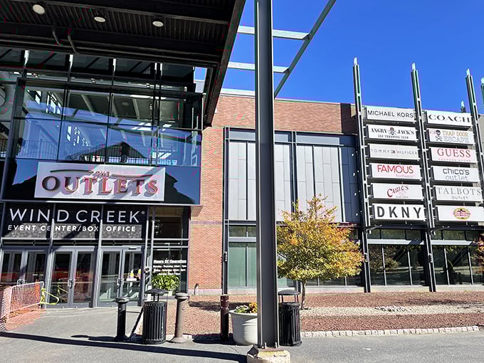 The entrance promises retail adventures with a directory of fashion heavyweights—Michael Kors, Coach, and Tommy Hilfiger—all offering their wares at prices that won't induce cardiac arrest.