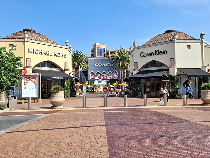 The designer trifecta: Michael Kors, Coach, and Calvin Klein form the holy trinity of outlet shopping, beckoning with promises of affordable luxury.