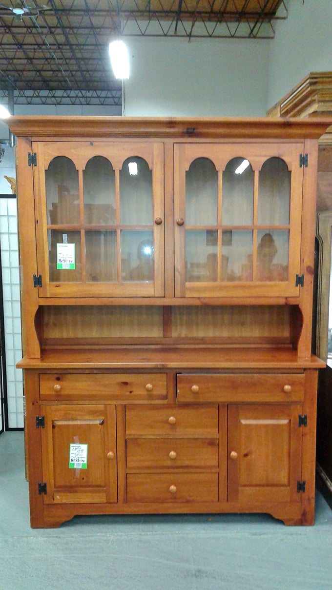 This isn't just a hutch—it's a time machine to Sunday dinners at grandma's, complete with glass doors perfect for displaying the good china you only use twice a year.