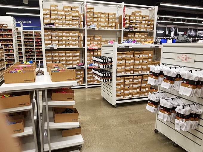 The shoe section at Reebok looks like sneaker heaven – rows upon rows of boxes waiting to find their sole mates.