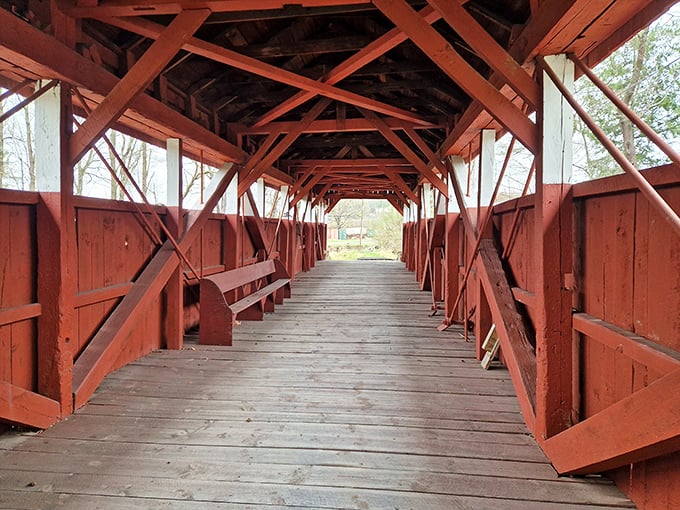 Inside the bridge, a mesmerizing wooden cathedral unfolds. The intricate lattice of beams creates a tunnel-like passage that whispers stories of centuries past.
