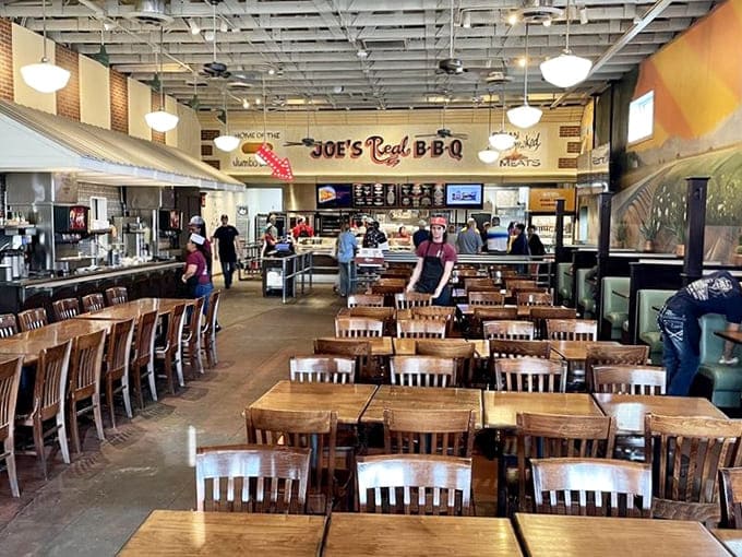 Inside, wooden tables and cafeteria-style service create that perfect "hurry up and wait" paradox—you'll move quickly through the line but linger for hours over your meal.