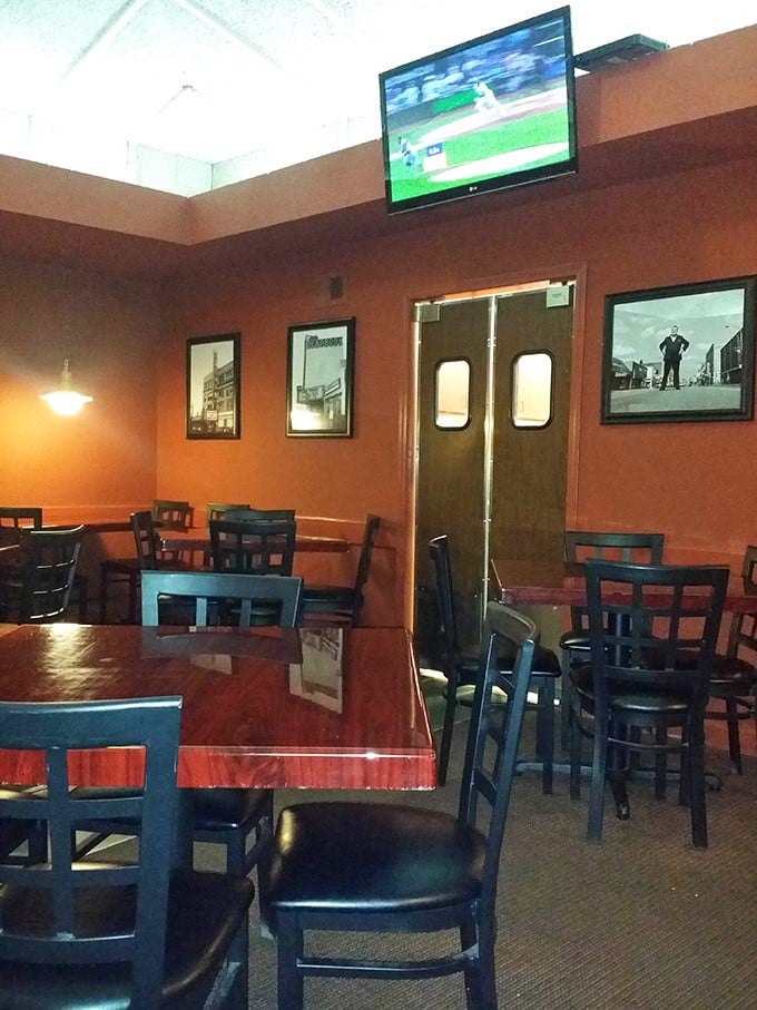 Inside, time stands still in the best possible way – wood paneling, simple tables, and the promise of burger perfection just moments away.