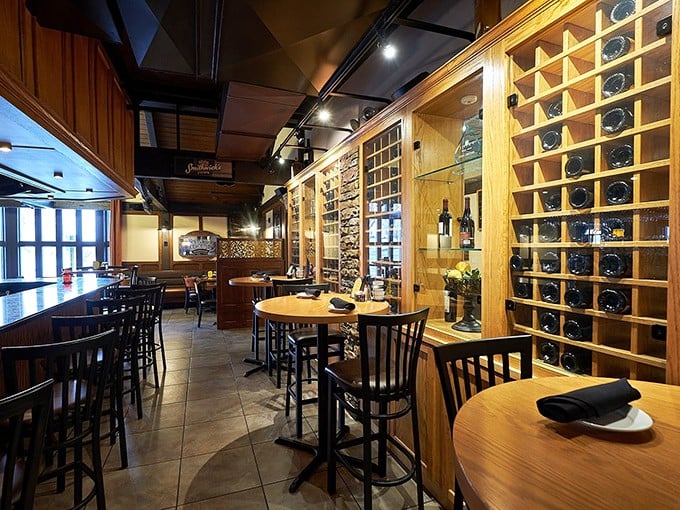 Wine lovers rejoice! The impressive wooden racks aren't just for show—they're a preview of the perfect pairing awaiting your steak.