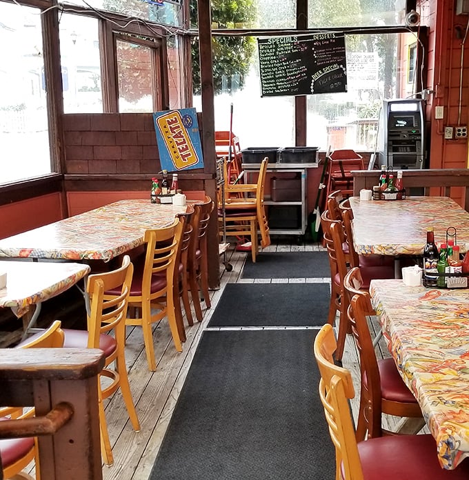 Inside, colorful oilcloth-covered tables and wooden chairs create that perfect "we've-been-here-forever" vibe. Like dining in your favorite aunt's beach cottage—if she were an amazing seafood cook.