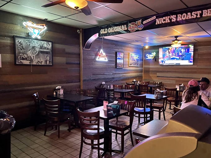 Step inside and you're transported to a Philadelphia time capsule—wood paneling, sports memorabilia, and the intoxicating aroma of slow-roasted meat that makes waiting worthwhile.