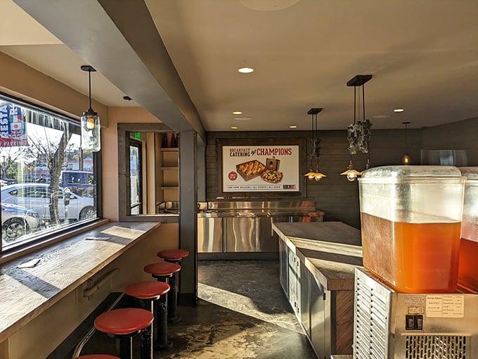 Where sandwich artistry happens. Those red stools aren't just seating—they're front-row tickets to the best show in Mission Hills.