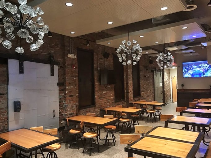 Industrial-chic meets BBQ heaven with exposed brick walls and crystal chandeliers that say, "Yes, we take our meat seriously, but we're not savages."