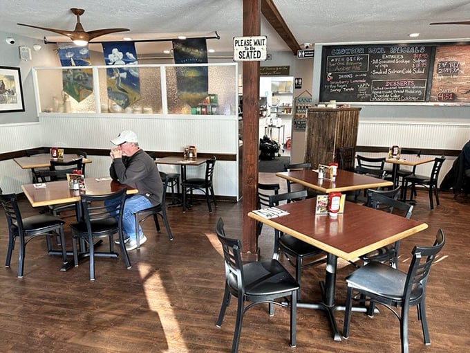 Simple wooden tables bathed in natural light create the perfect stage for seafood drama. No pretension here—just the promise of ocean-to-table perfection.