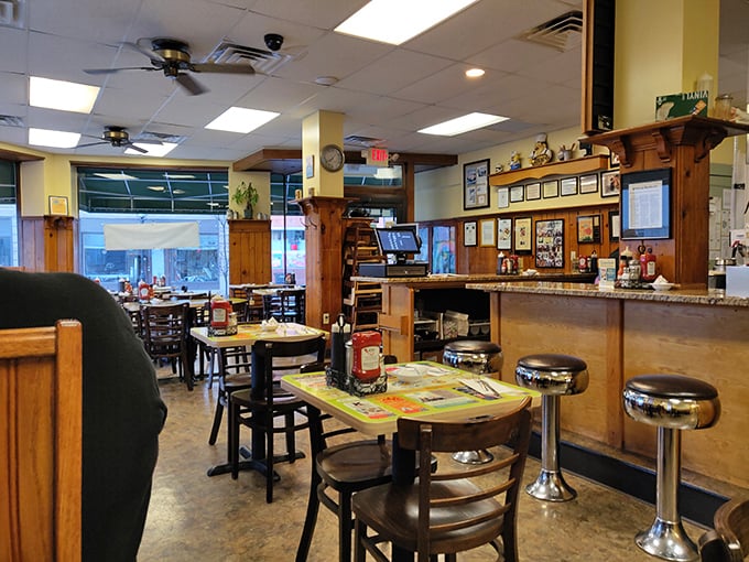 Classic diner vibes with wooden accents and chrome stools – where conversations flow as freely as the coffee.