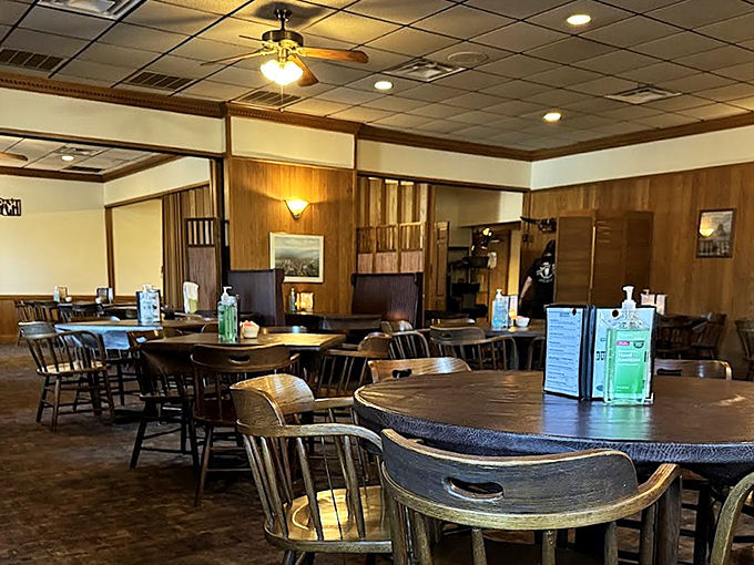 Step inside and time stands still – wooden captain's chairs, warm paneling, and ceiling fans spinning lazily above tables that have hosted countless celebrations.