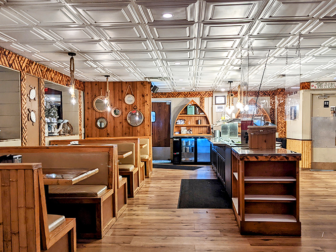 Step inside where nautical charm meets serious comfort food – like your favorite uncle's fishing cabin went upscale.