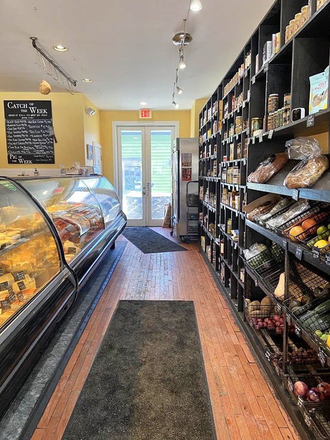 Narrow aisles lined with gourmet treasures create an intimate shopping experience where every inch is dedicated to the pursuit of flavor excellence.