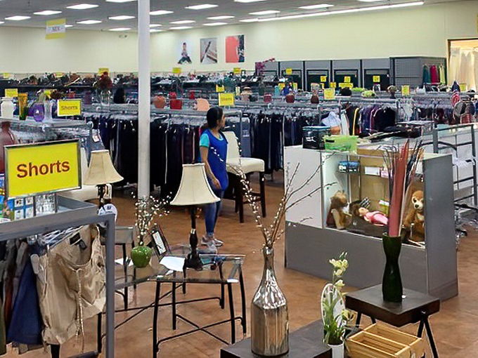 Organized chaos at its finest. Racks stretch toward the horizon while home décor items create little vignettes of possibility throughout the store. 