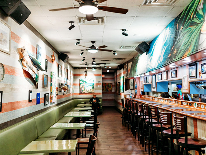 Long, narrow, and packed with character—the interior feels like a secret club where the password is "fresh seafood."
