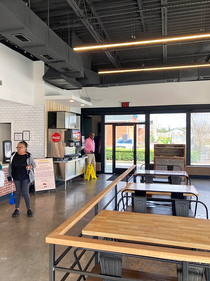 Modern industrial meets Southern comfort in this clean, inviting space where serious chicken business happens daily.