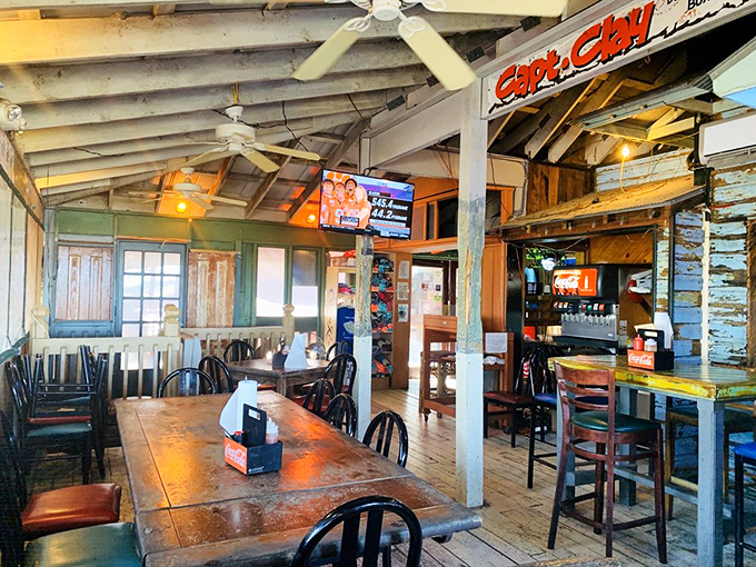 Rustic wooden beams and weathered walls tell stories of countless seafood feasts and salty conversations.