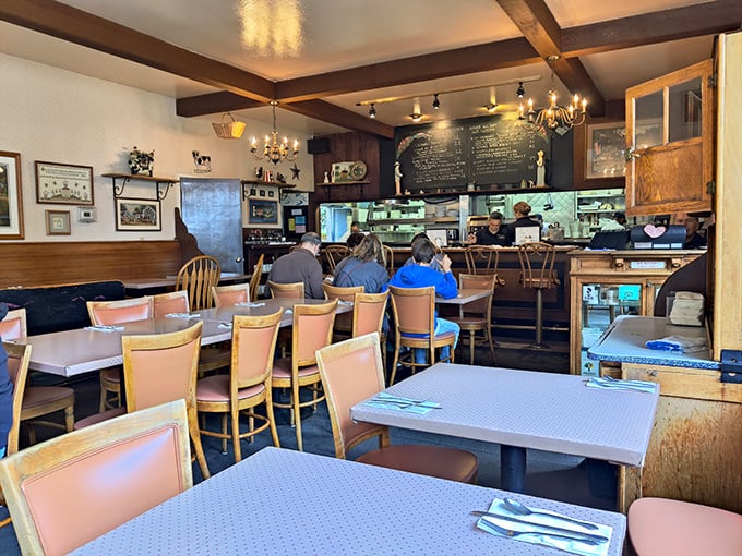 The dining room where breakfast dreams come true. Those pink chairs aren't just seating—they're front-row tickets to the breakfast theater.