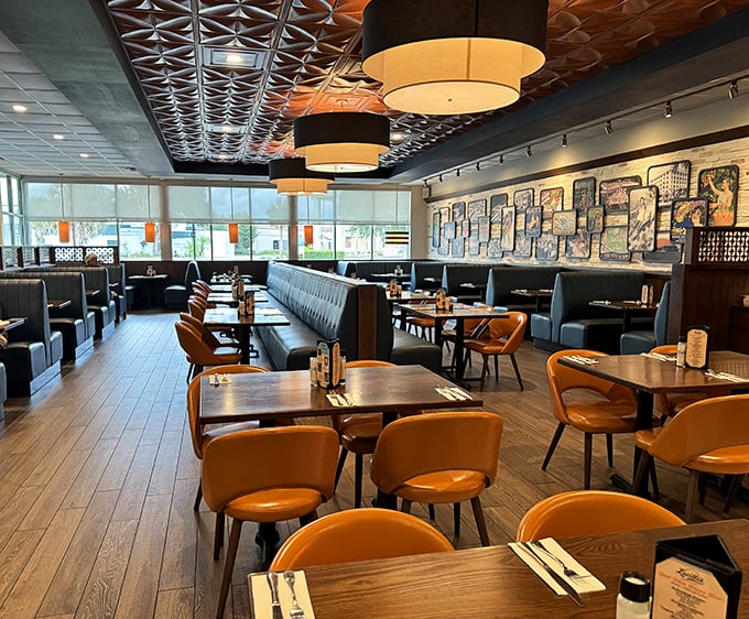 Mid-century modern meets cozy comfort in Lucille's interior, where those distinctive drum lights and warm wood tones invite you to settle in.