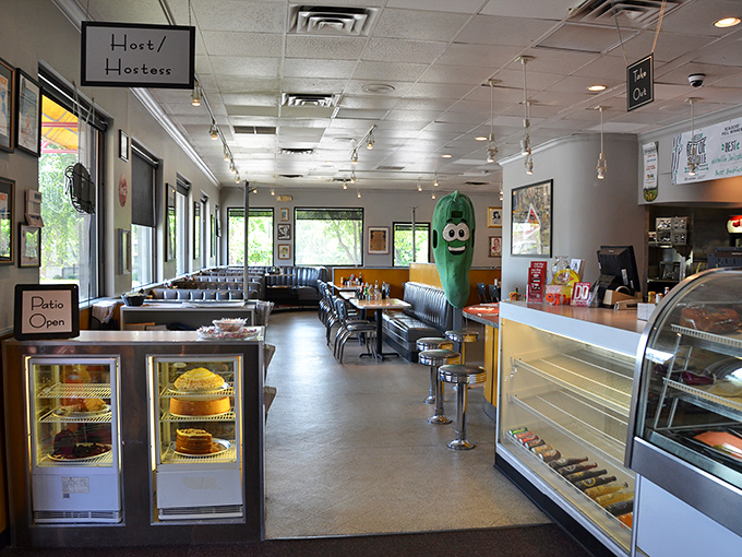 Classic deli ambiance with a whimsical touch—that pickle mascot isn't just decoration, it's practically the unofficial mayor of Noshville.