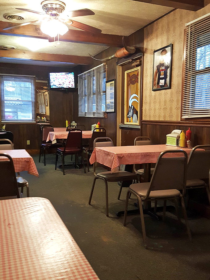Red and white checkered tablecloths, wood-paneled walls, and zero pretension—this dining room hasn't changed in decades, and that's precisely its charm.