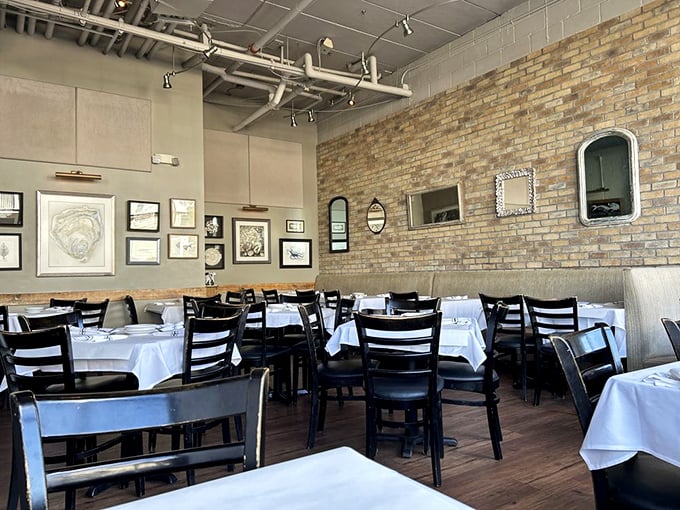 Exposed brick walls and white tablecloths create that perfect balance of casual elegance—seafood deserves nothing less.