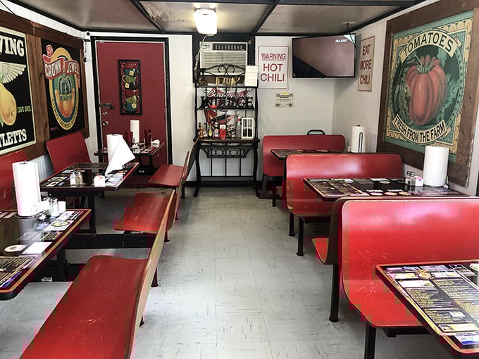 Red benches, vintage signs, and that "HOT CHILI" warning - the BBQ equivalent of a cozy living room where calories don't count.