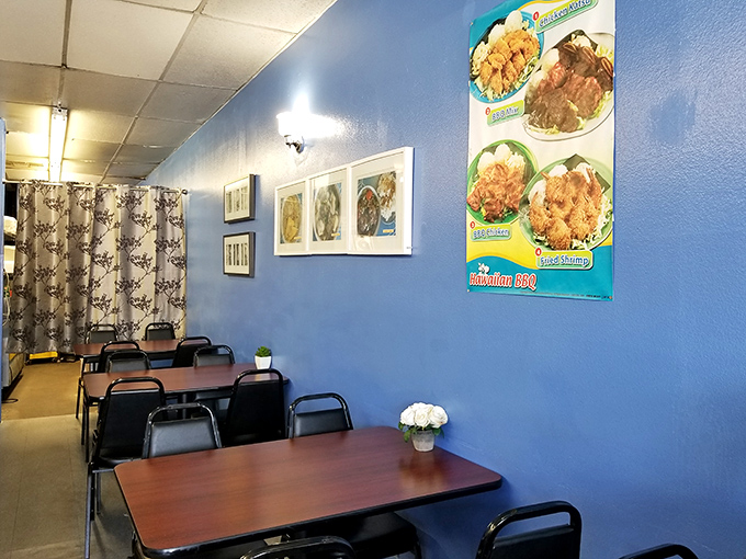 Blue walls and simple furnishings set the stage where flavor, not decor, takes the starring role in this humble dining space.